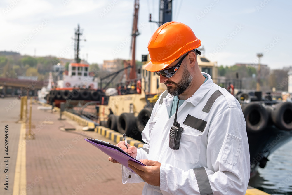 Inspector doing inspaction of ship in port Stock Photo | Adobe Stock
