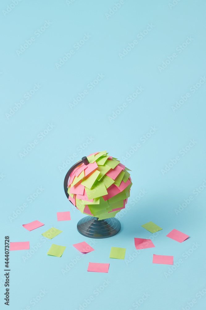 Colored sticky paper stickers on globe Stock Photo | Adobe Stock