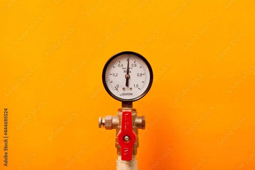 Pipe with a tap and a pressure gauge that shows the pressure in the ...