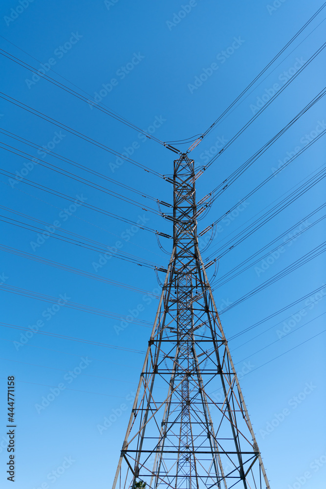 electrical power lines of pylon producing energy with voltage ...