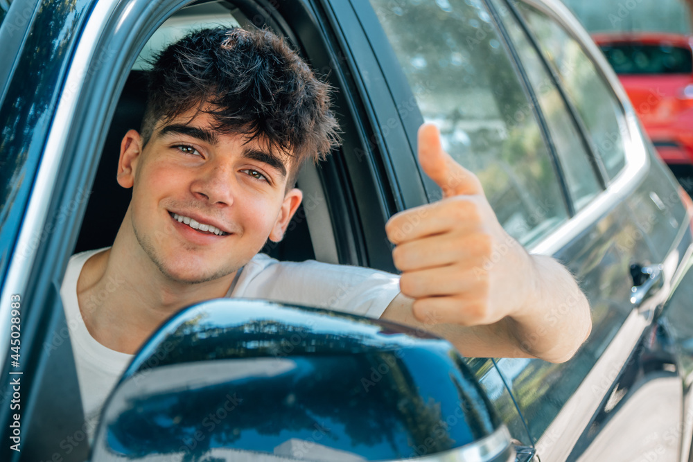 novice driver in the car smiling Stock Photo | Adobe Stock