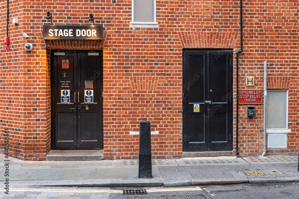 Stage Door, London. A securely closed stage door at the rear of a ...
