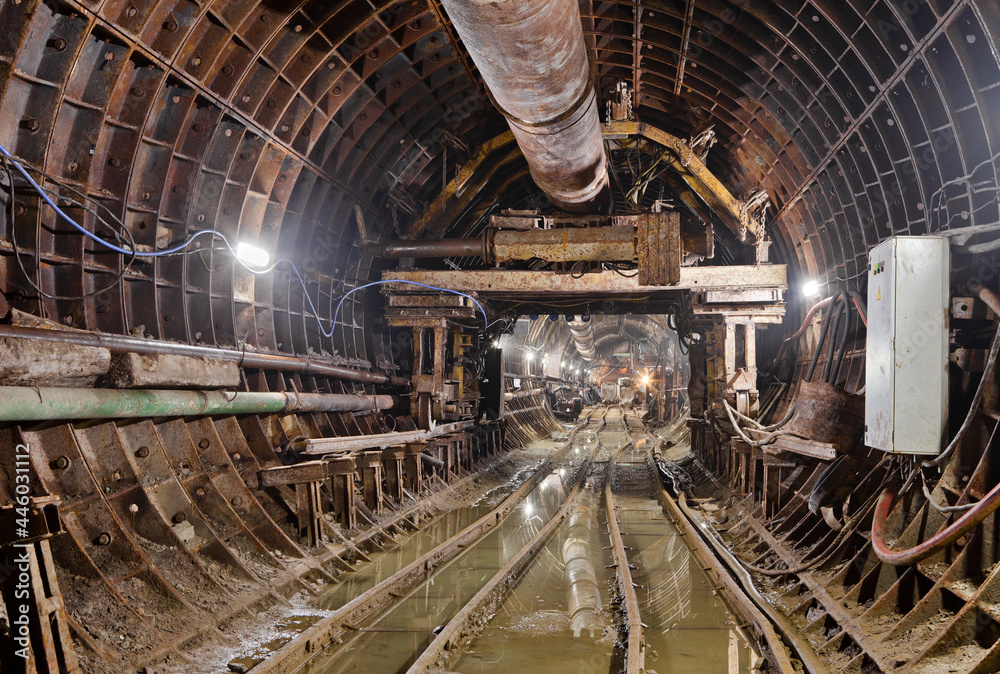 Subway tunnel construction. Deep metro line construction. Old mine for ...
