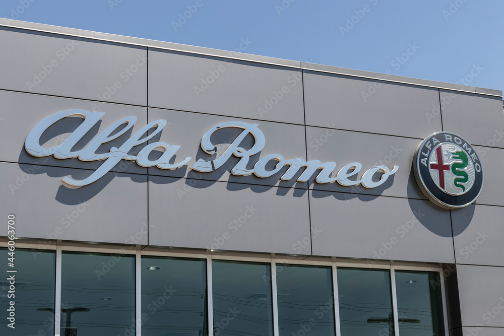 Alfa Romeo logo. The logo shows a red cross, and the biscione, a ...