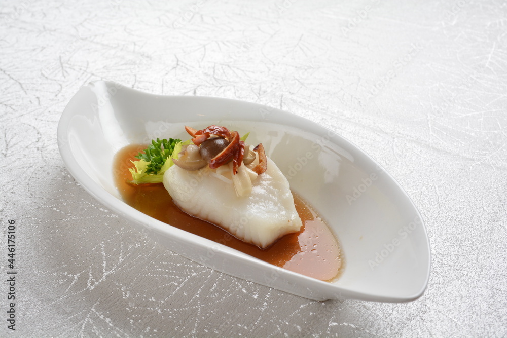 steamed fresh cod grouper fish fillet with vegetable, herb and black ...
