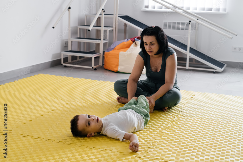 Foto de Stock Rehabilitation of children with cerebral palsy. Physical ...