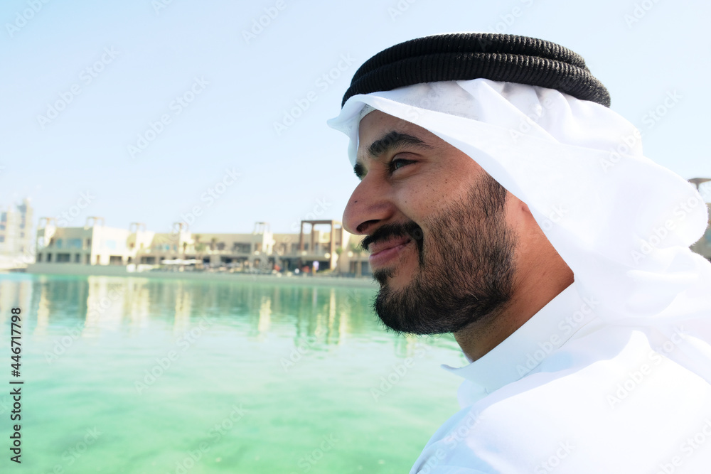 Portrait of Happy Emirati Arab man on Kandura Dish Dash traditional men ...