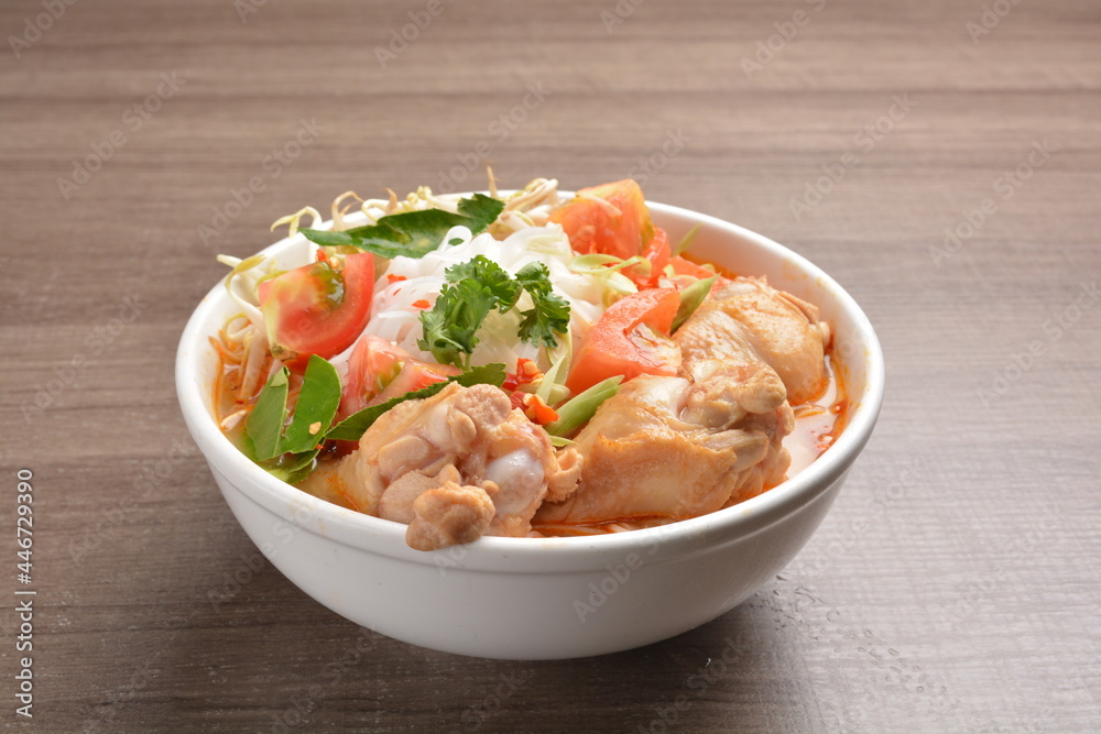 braised cook chicken drumstick meat with red spicy curry soup and ...