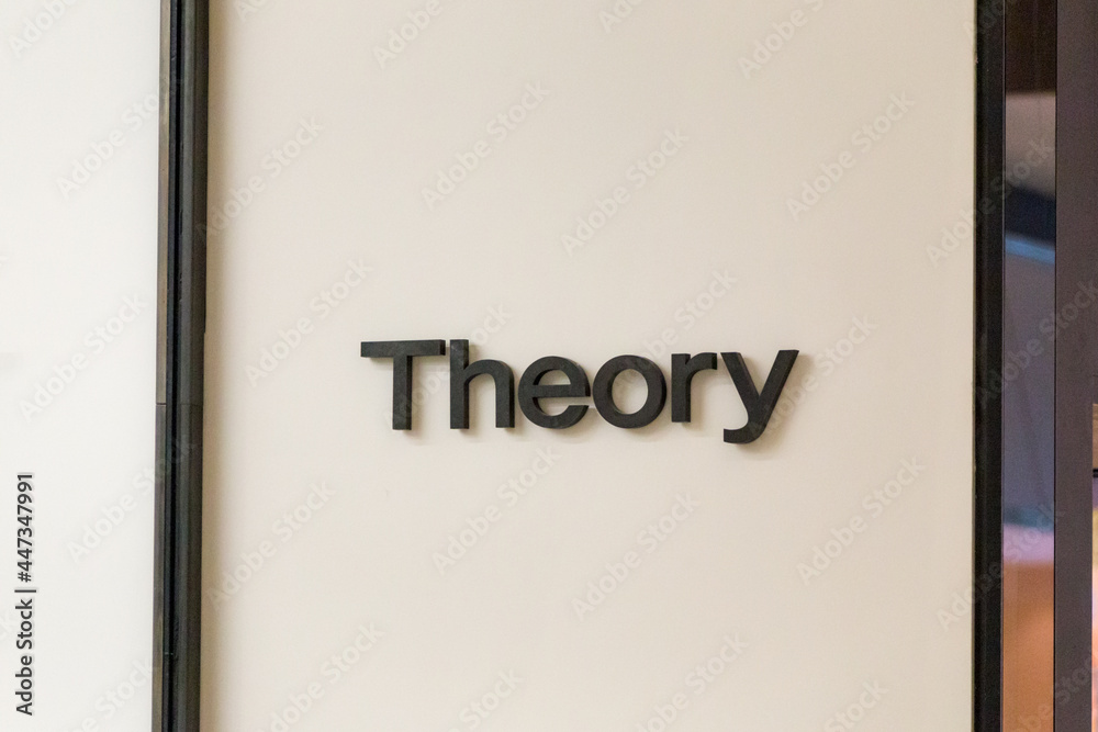Theory hanging store logo sign in New York, USA. Theory is New York ...