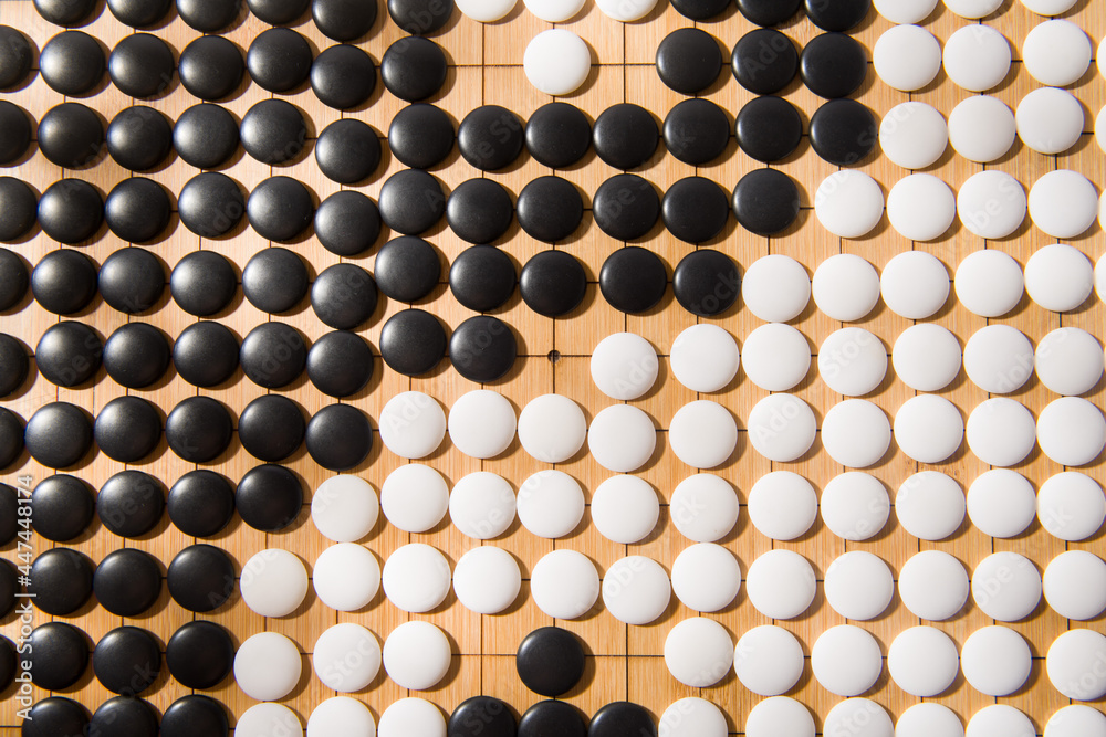 Desk for board game Go or Weiqi and black and white bones. Traditional ...