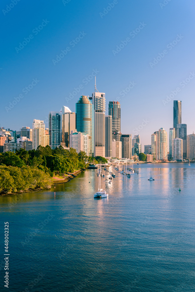 Brisbane city buildings and river seen in early morning light from ...
