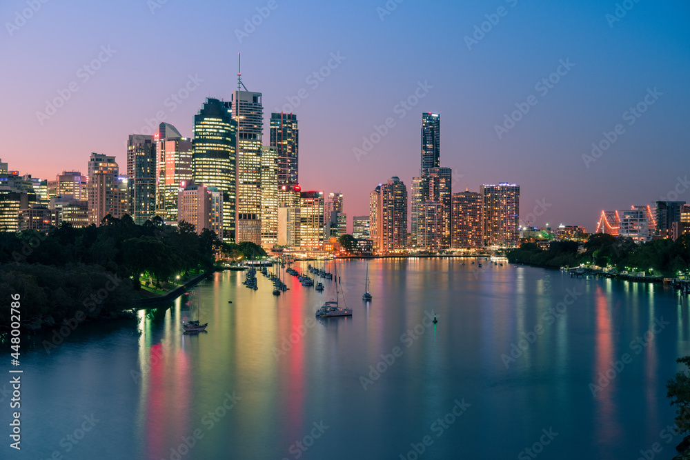 Brisbane city buildings and river seen at sunset from Kangaroo Point ...