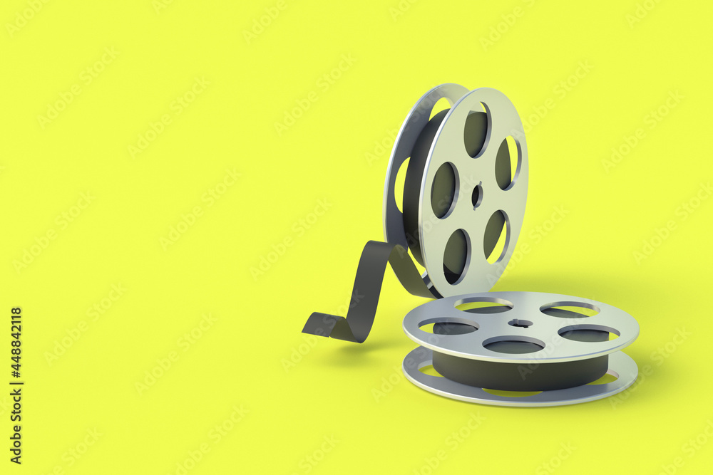 Film reel in metal frame on yellow background. Cinematography tape ...