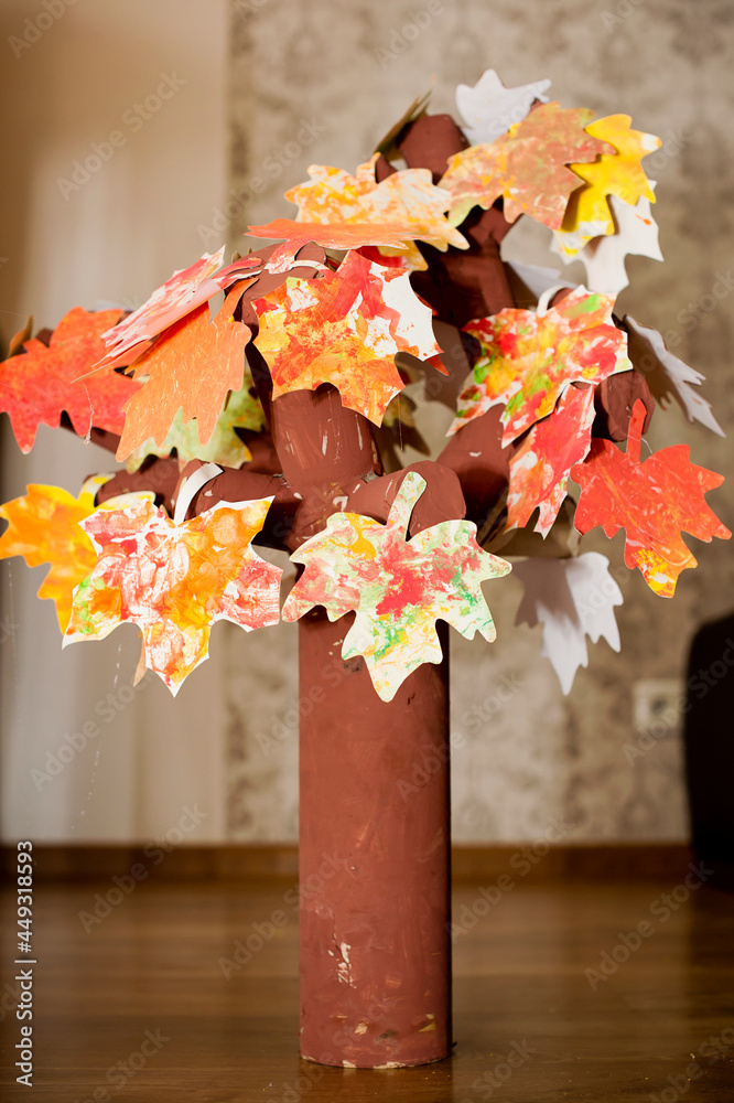 Autumn in paper. Food foil and toilet paper tubes glued as a tree trunk ...