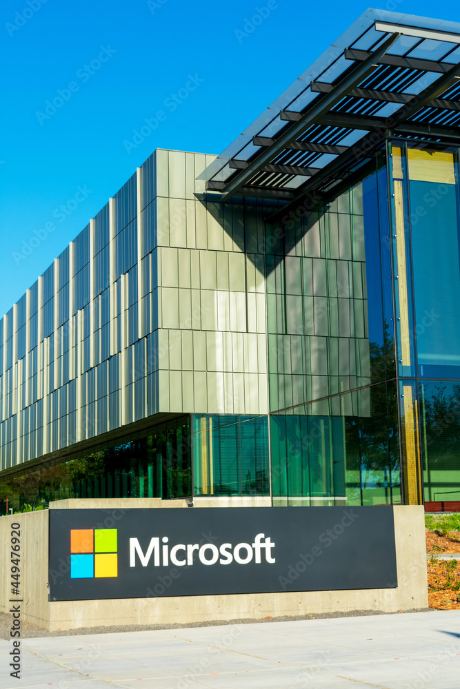 Microsoft sign, logo with four color squares at the office building of ...