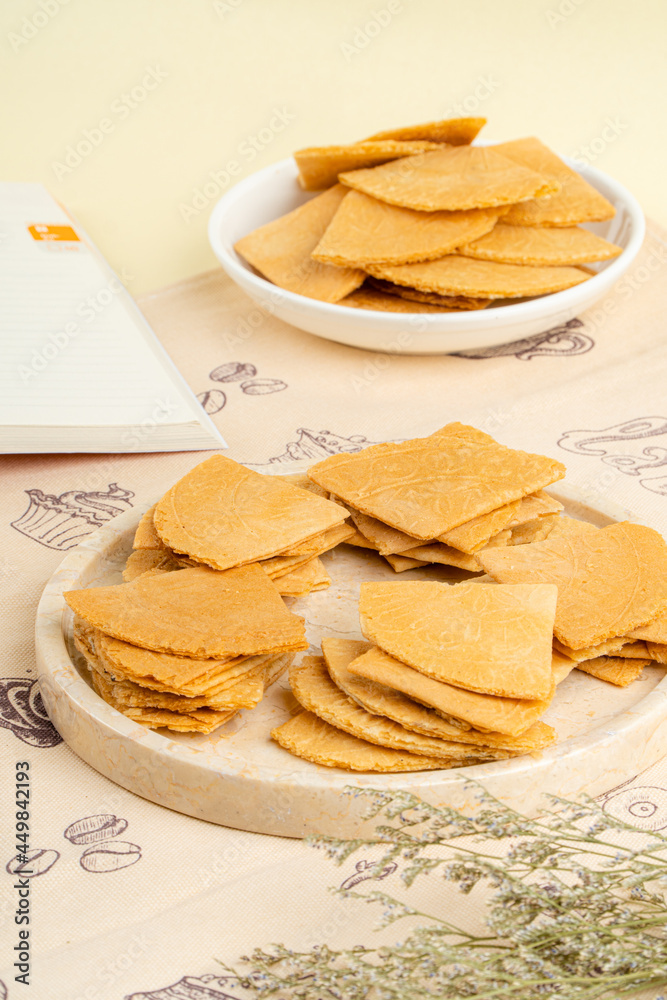 Foto Kue semprong is an Indonesian traditional wafer snack made by ...