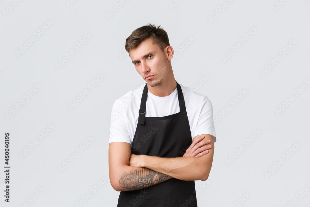 Employees, grocery stores and coffee shop concept. Serious bothered and ...