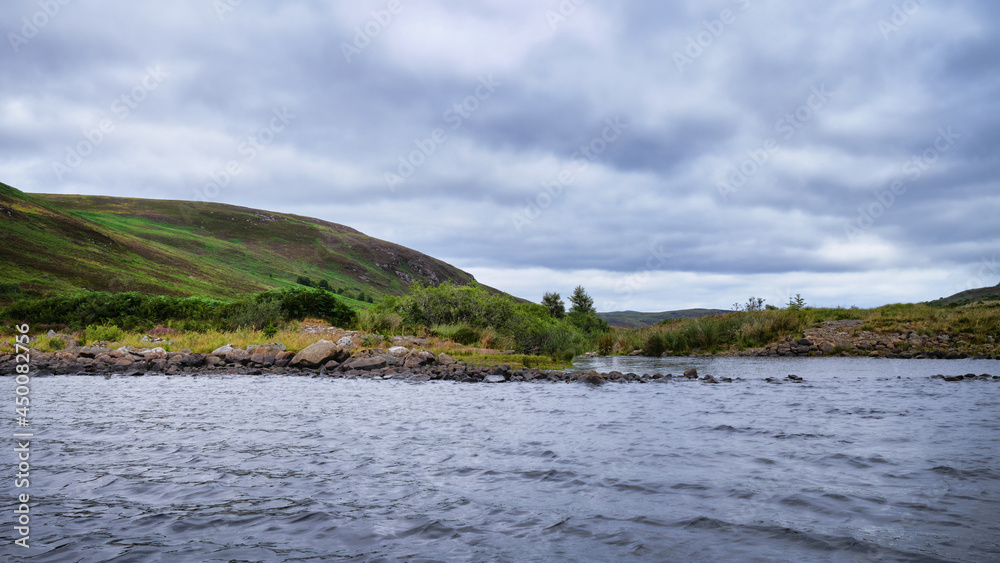 Loch Buidhe in Strath Carnaig in Sutherland in the Highlands with the ...