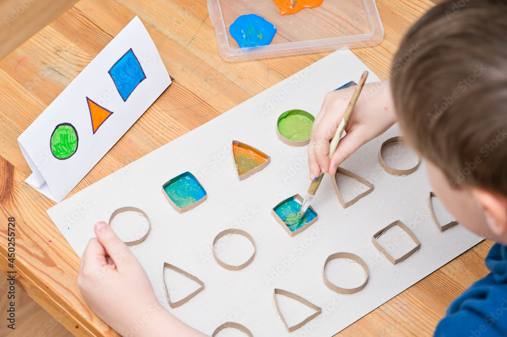 Child learn geometric shapes. Fine motor skills. Preschool or special ...