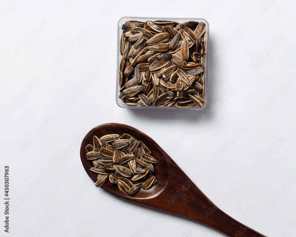 Kuaci made of sun seeds isolated on bright background. How to process ...