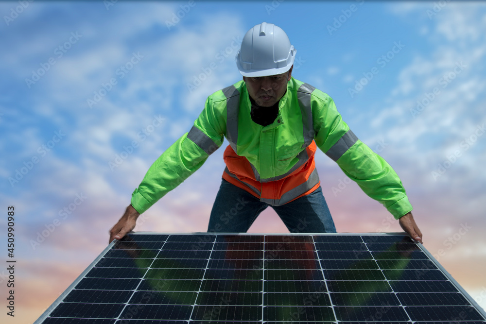 engineer or electrician working on replacement solar panel at solar ...