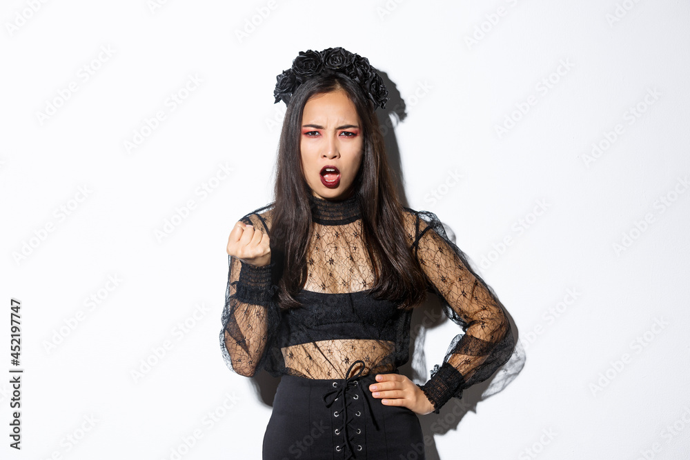 Image of angry and disappointed beautiful girl in halloween costume ...