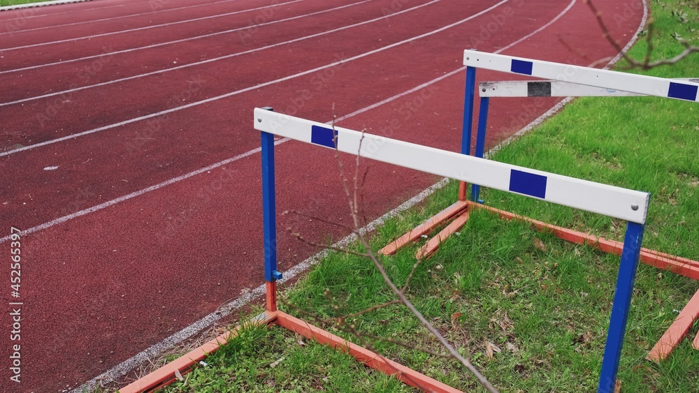 Hurdling Obstacles Standing Next to Running Track at Athletics Stadium ...