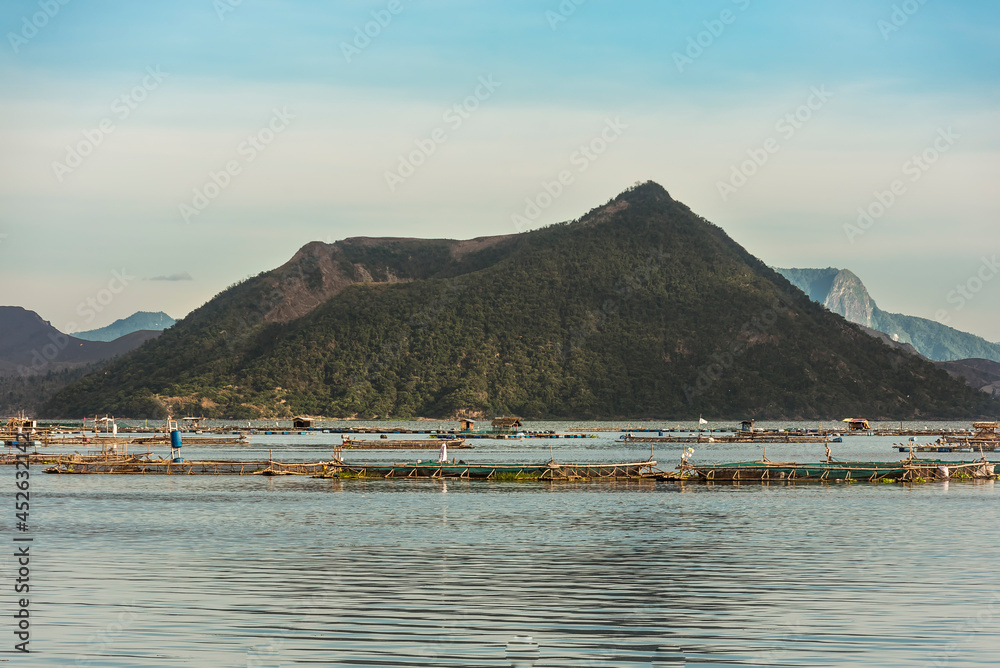 Binintiang Malaki, a crater of Taal volcano complex and fish pens at ...