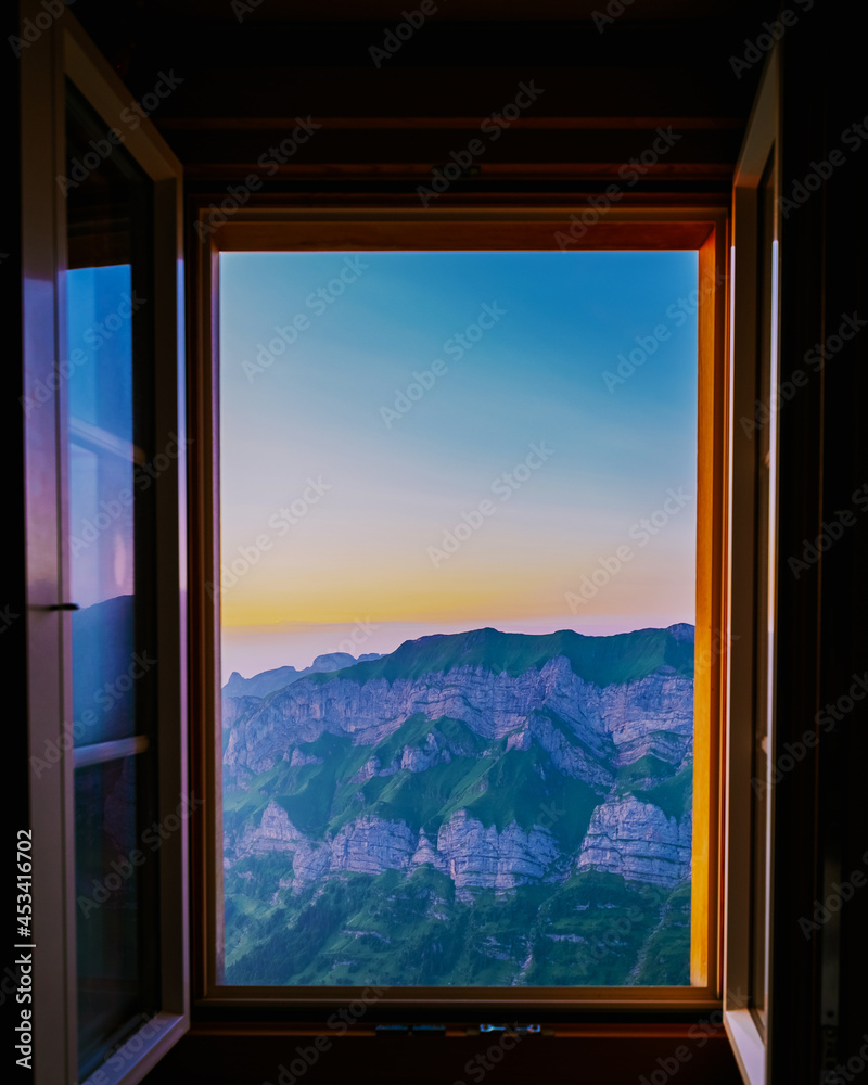 view trough the window at Schaefler Altenalptuerme mountain ridge swiss ...