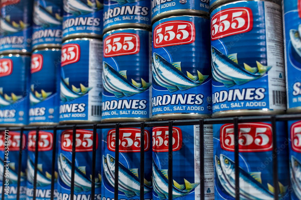 555 sardines canned in natural oil on display at a shelf at a ...