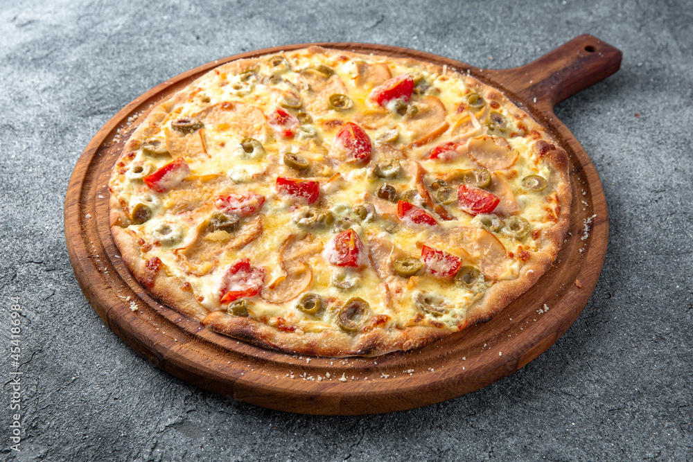 Tasty hot italian pizza with ham, mushrooms, olives. Pizzeria menu ...