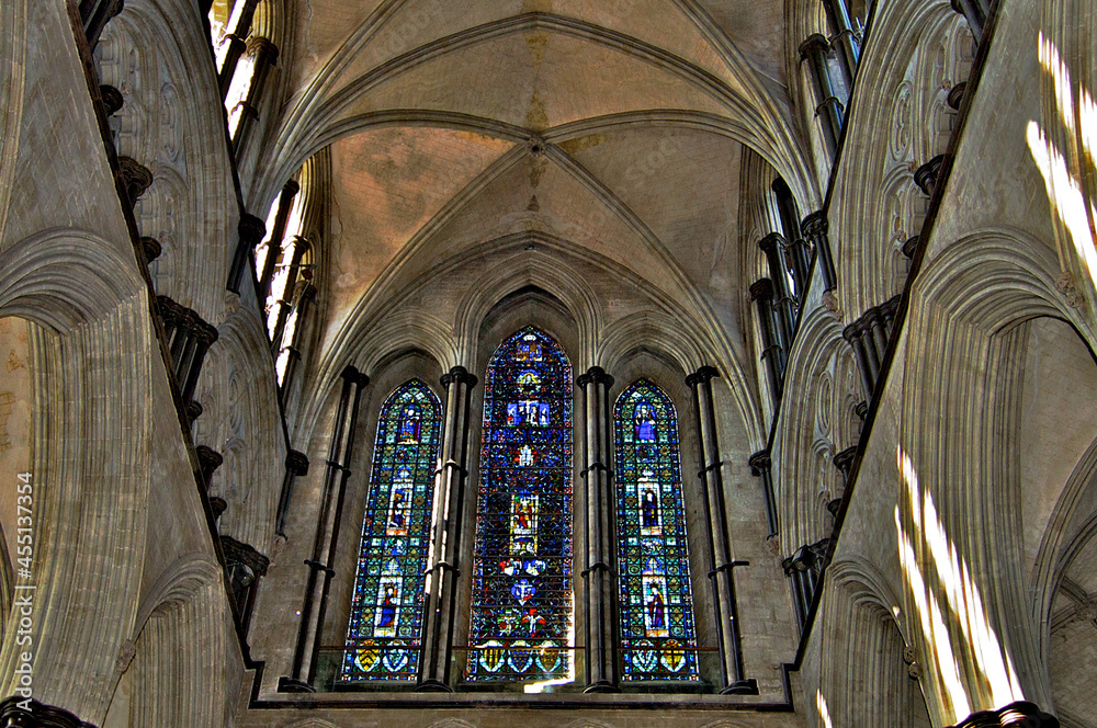 The west front with 13th century stained glass lancet window and ribbed ...