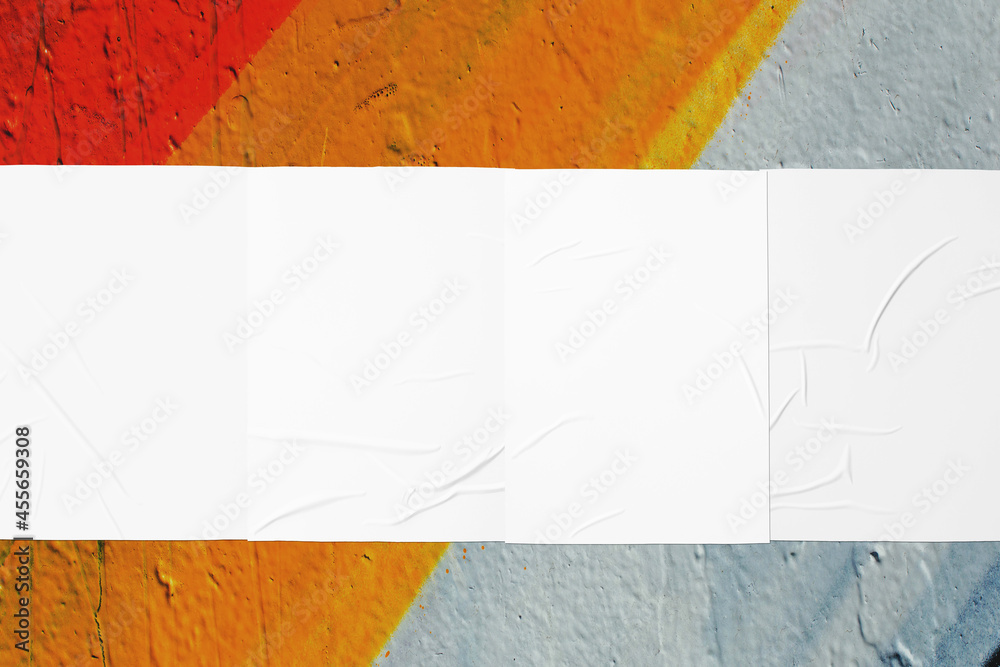 Closeup of colorful messy painted urban wall texture with four wrinkled ...