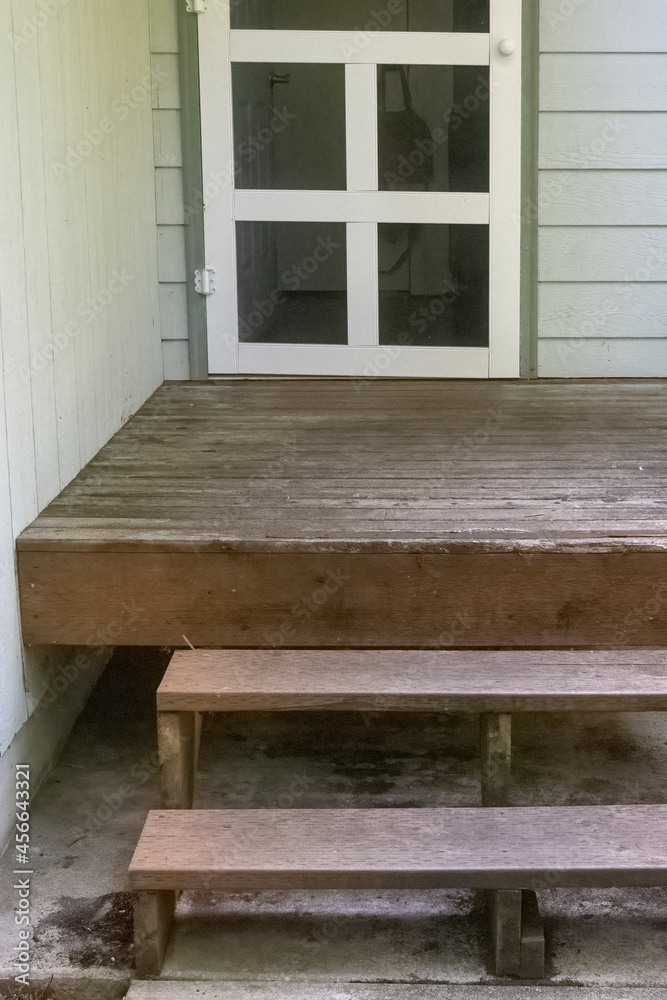 old porch steps on a concrete slab Stock Photo | Adobe Stock