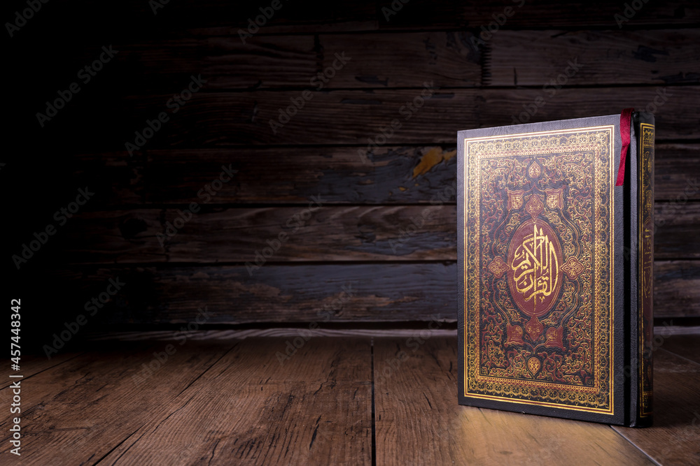 Photo Stock Islamic concept - The Holy Al Quran with written Arabic ...