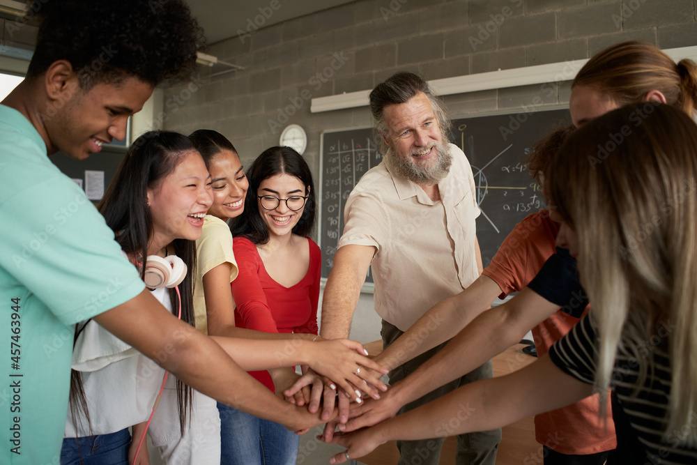 Group of students Teamwork with a teacher. Stacking Hand Concept. Stock ...