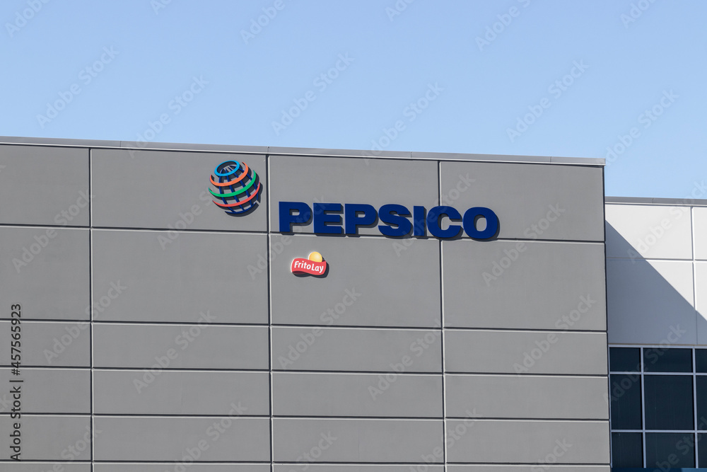 Fotografia do Stock Pepsi logo and signage. Pepsi and PepsiCo are among ...