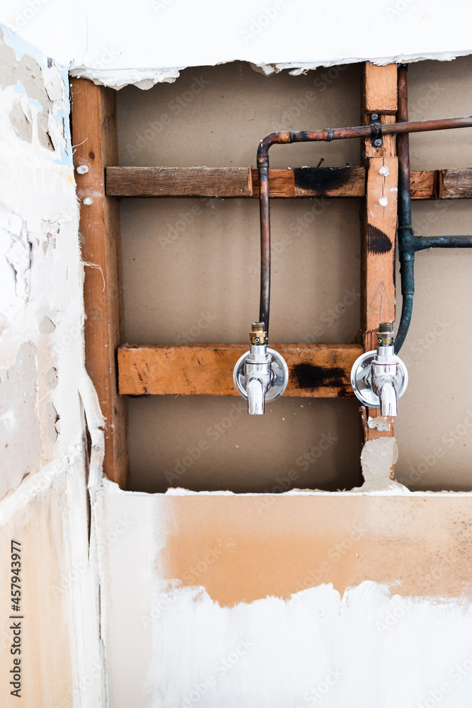 laundry room renovation with plaser walls interior exposed with taps ...
