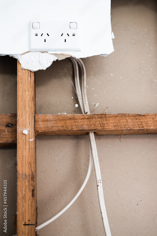 laundry room renovation with plaser walls interior exposed with visible ...