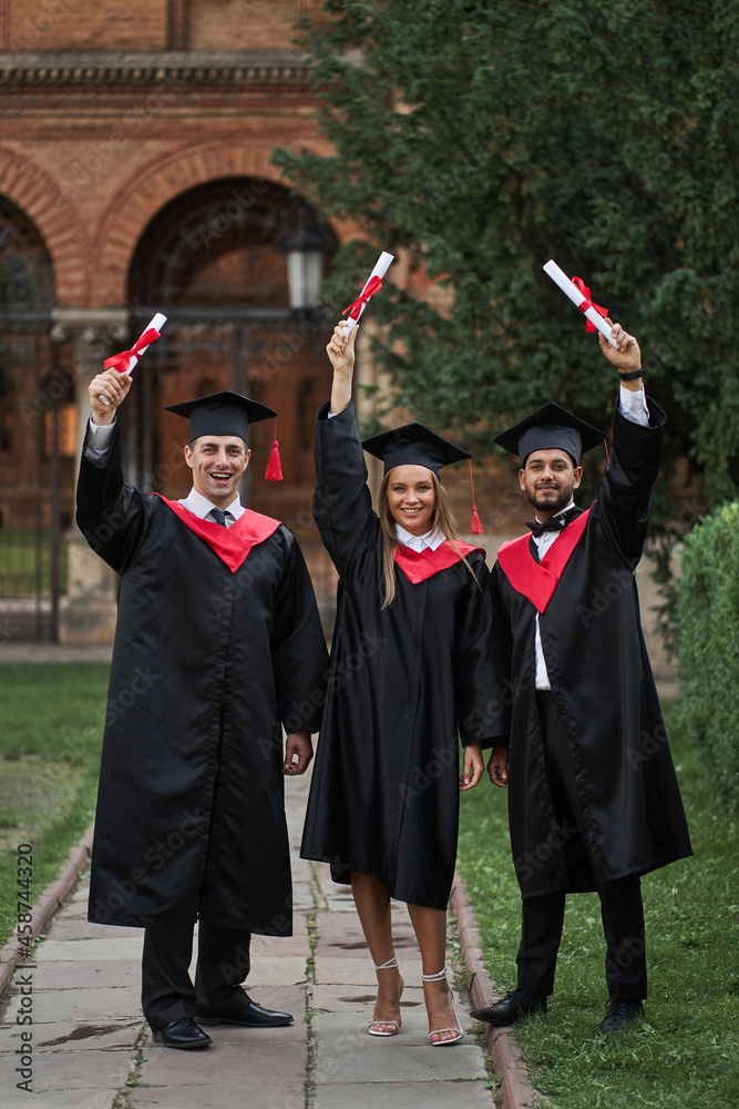 Stock-Foto „International graduates from celebrating diplomas in ...