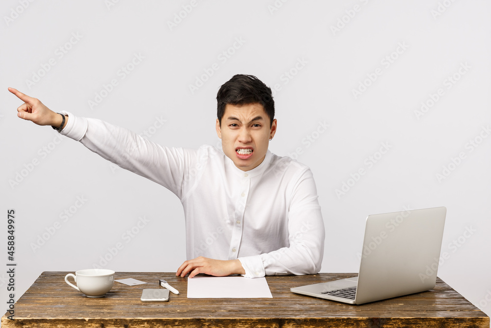 Get out of my office, go. Angry, aggressive and outraged asian male ...