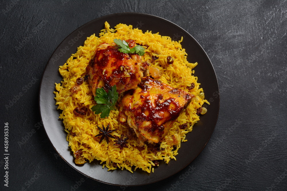 The national Saudi Arabian dish chicken kabsa with roasted chicken ...