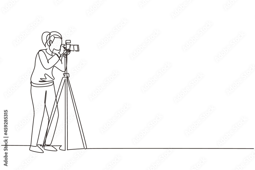 Single one line drawing professional girl photographer with camera pose ...