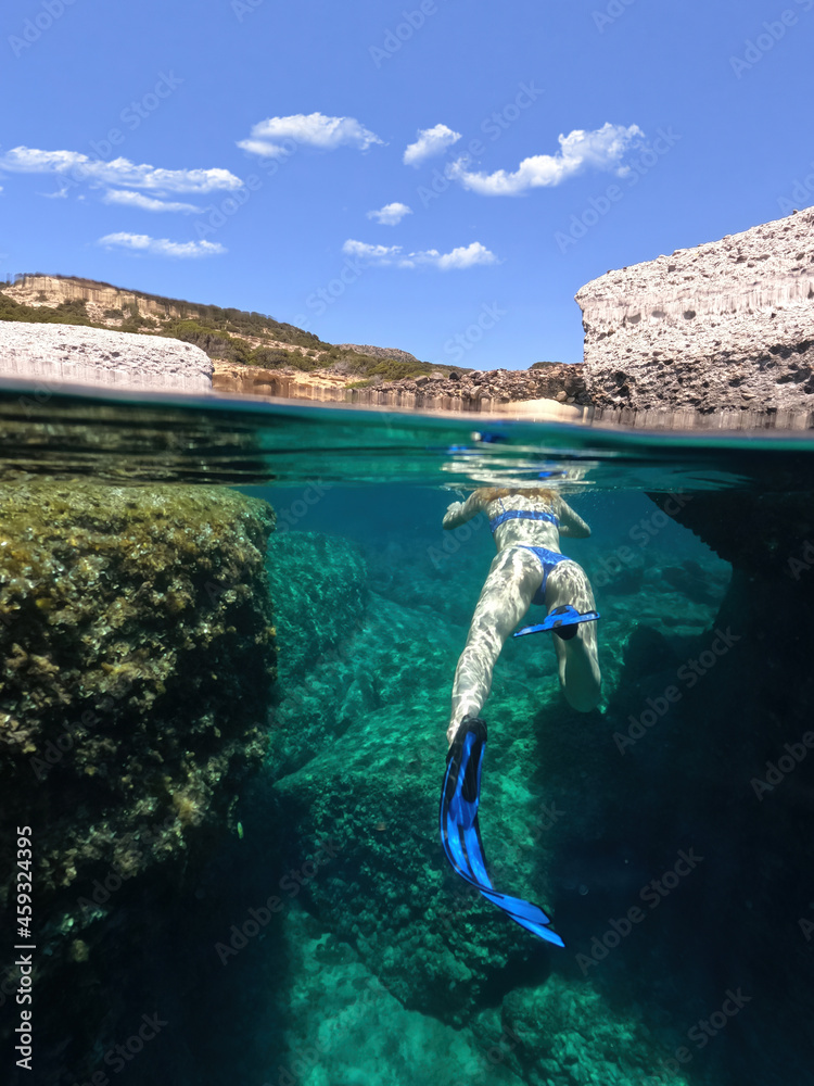 Underwater split photo of woman diver, snorkelling in beautiful ...