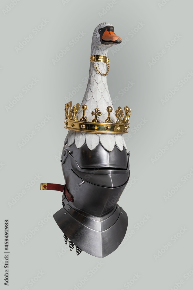 Medieval knightly Milanese helmet with a heraldic kleinod in the form ...