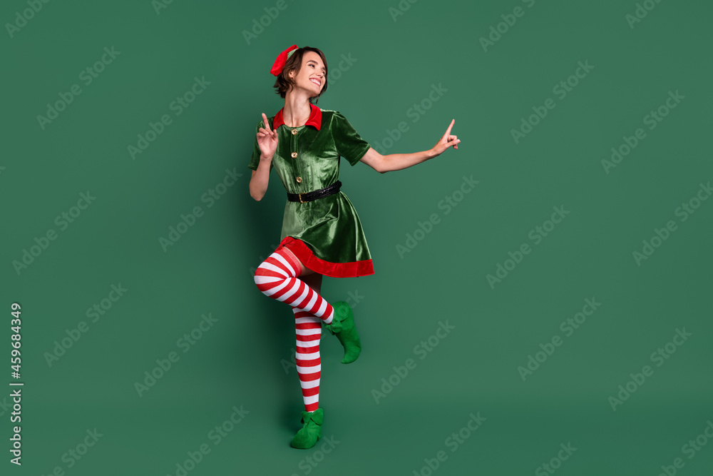 Full length body size view of attractive cheerful girl elf dancing ...