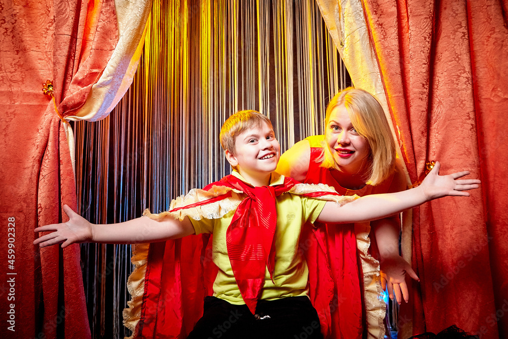 Family during a stylized theatrical circus photo shoot in a beautiful ...
