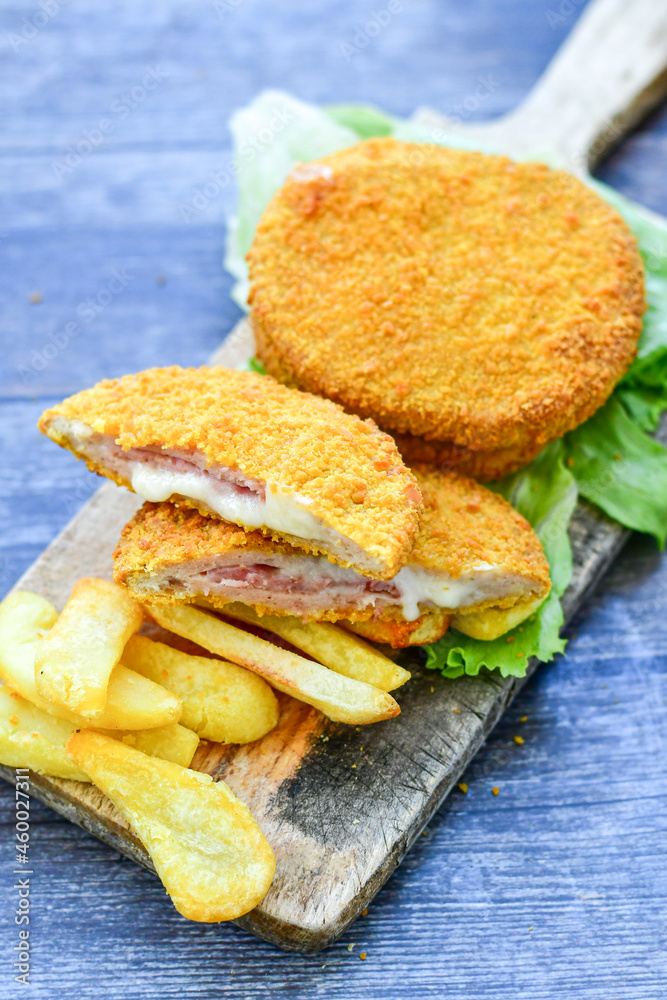 Crispy deep fried home made chicken Cordon bleu with cheese and ham and ...