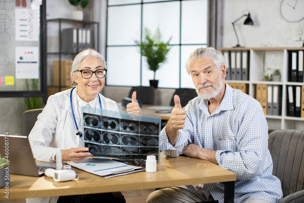 Stock-Foto „Mature doctor woman in white lab coat and retired man in ...