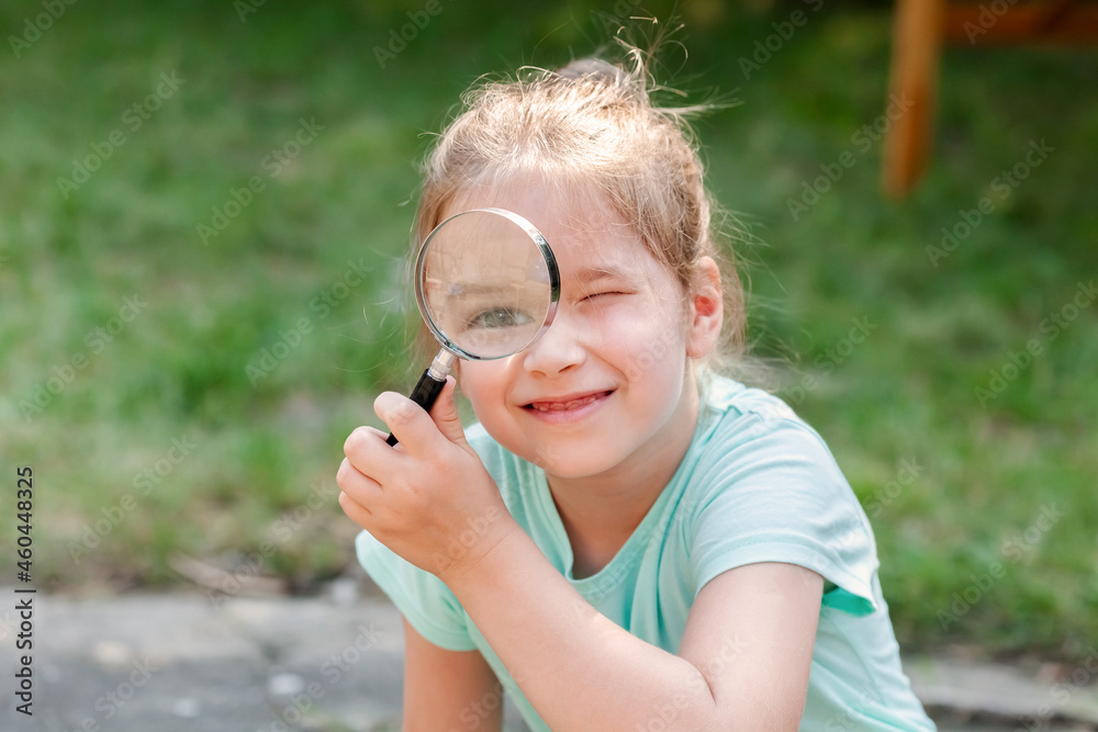 Curious young happy little girl, smart intelligent school age child ...